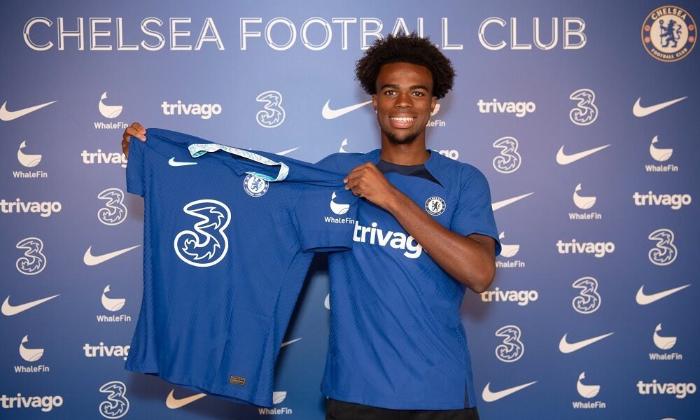 Chukwuemeka poses in Chelsea kit after completing £20m move